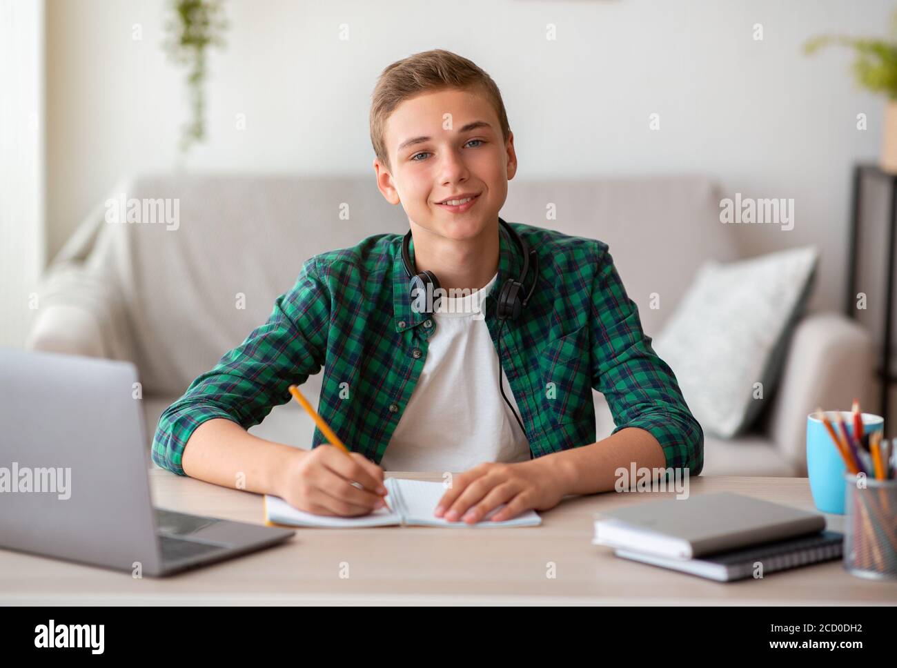 Teen reading desk homework education learning hi-res stock photography ...