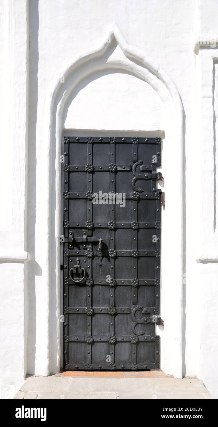 Ancient gate. Old metal black gate. Old vintage front door Stock Photo ...