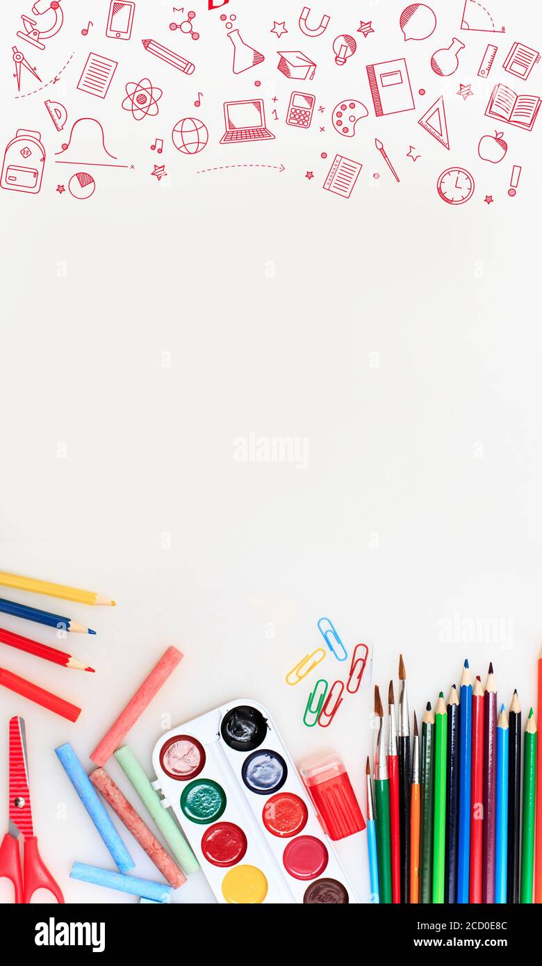 Colorful school supplies corner border over a white background with ...