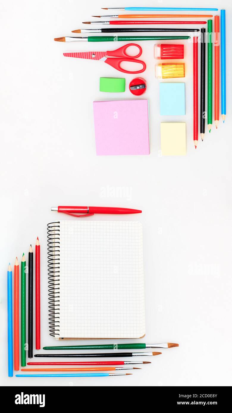 Colorful school supplies corner border over a white background with ...