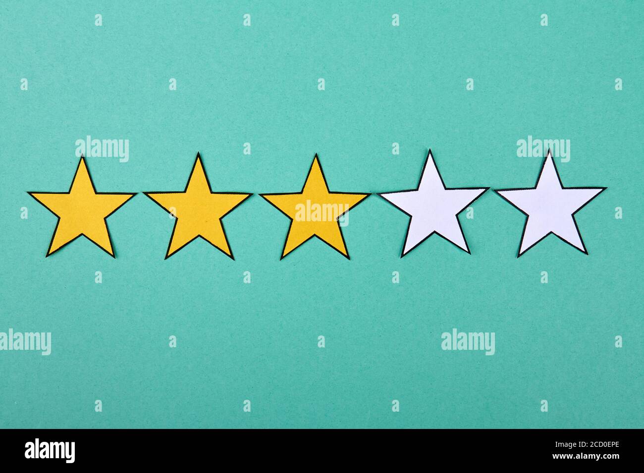 Three stars of five Stock Photo - Alamy