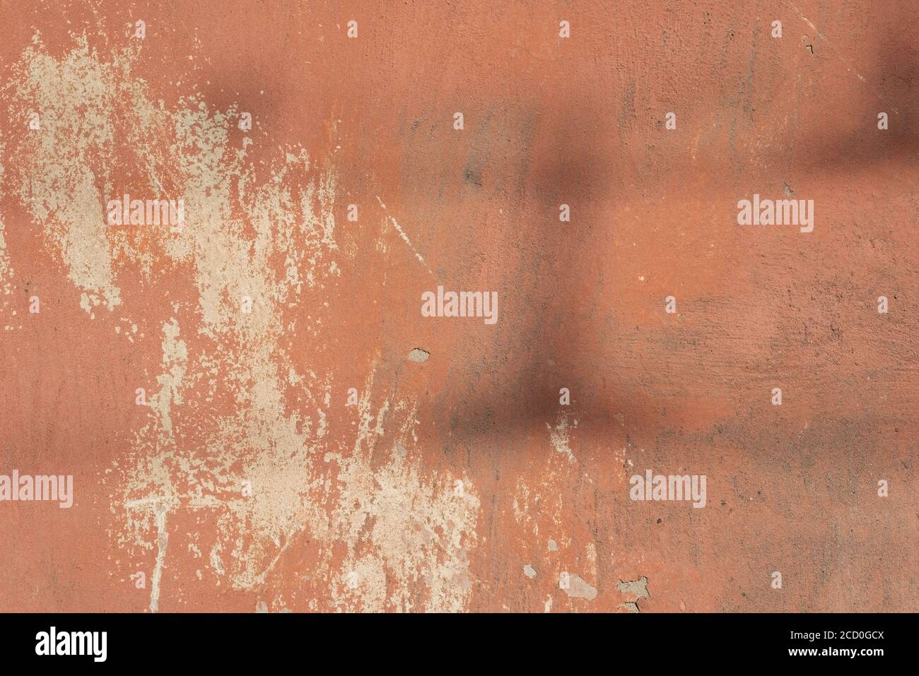 beige cracked plaster texture, with elements of rubbed white paint ...