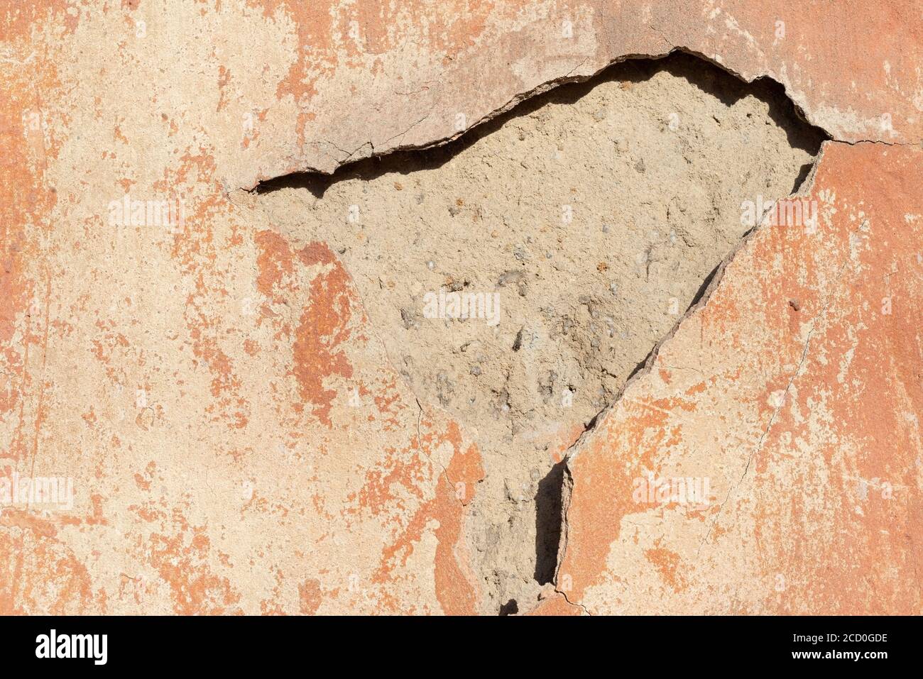 beige cracked plaster texture, with elements of rubbed white paint ...