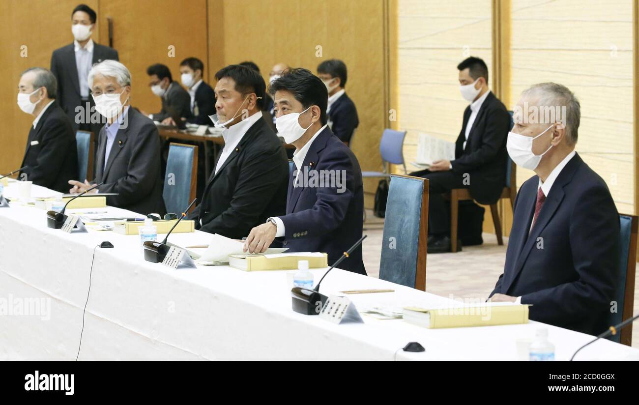 Japanese Prime Minister Shinzo Abe (2nd from R, front row), wearing a ...