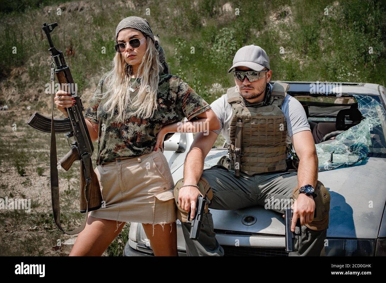 Female and male military soldier team with weapons. Guns and rifle. Man ...