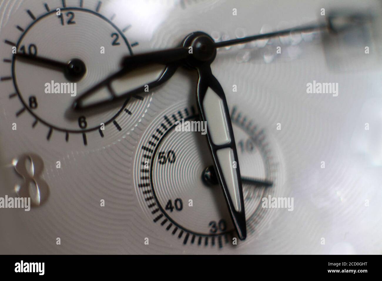 A watch with all needles, white background Stock Photo - Alamy