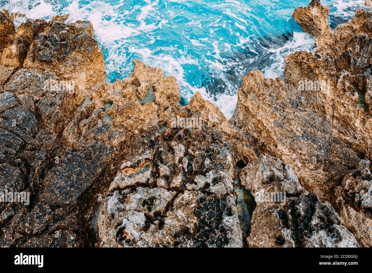 Dangerous rocky sea shore with azure water, aerial drone top view Stock ...