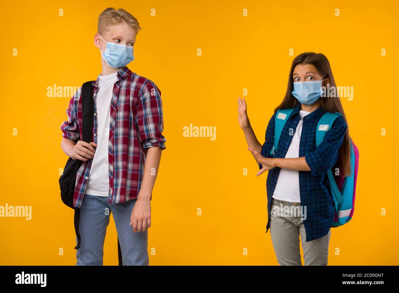 Two student standing together, scared girl gesturing stop Stock Photo ...