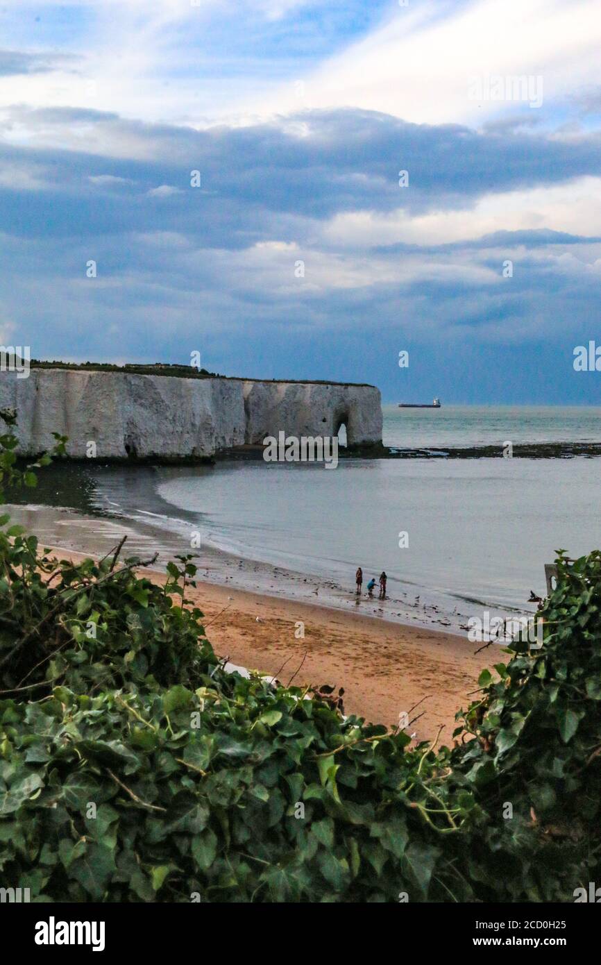 Beautiful Kingsgate Beach at sunset, showing the rock arch, near ...