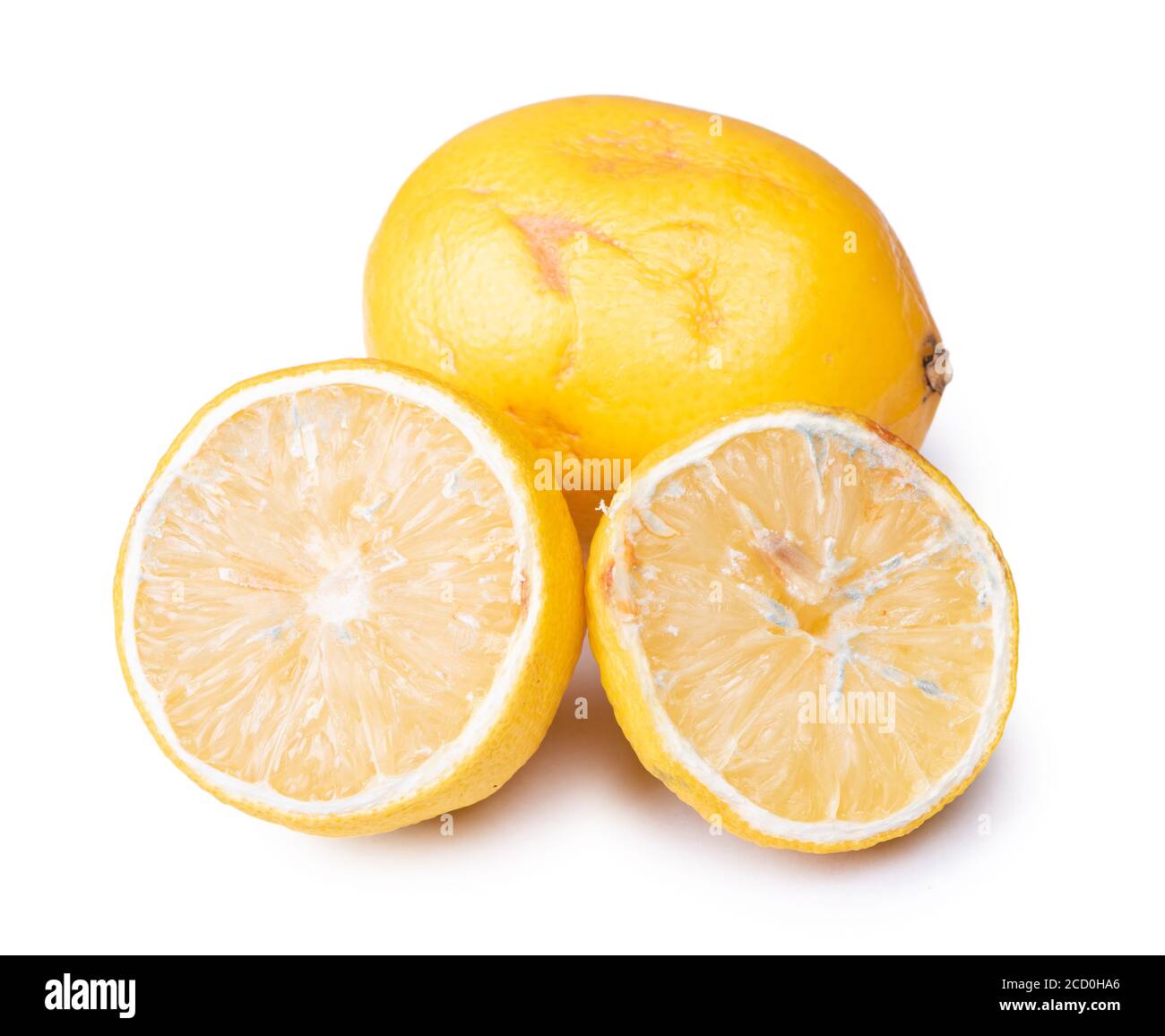 Spoiled lemons isolated on white Stock Photo - Alamy