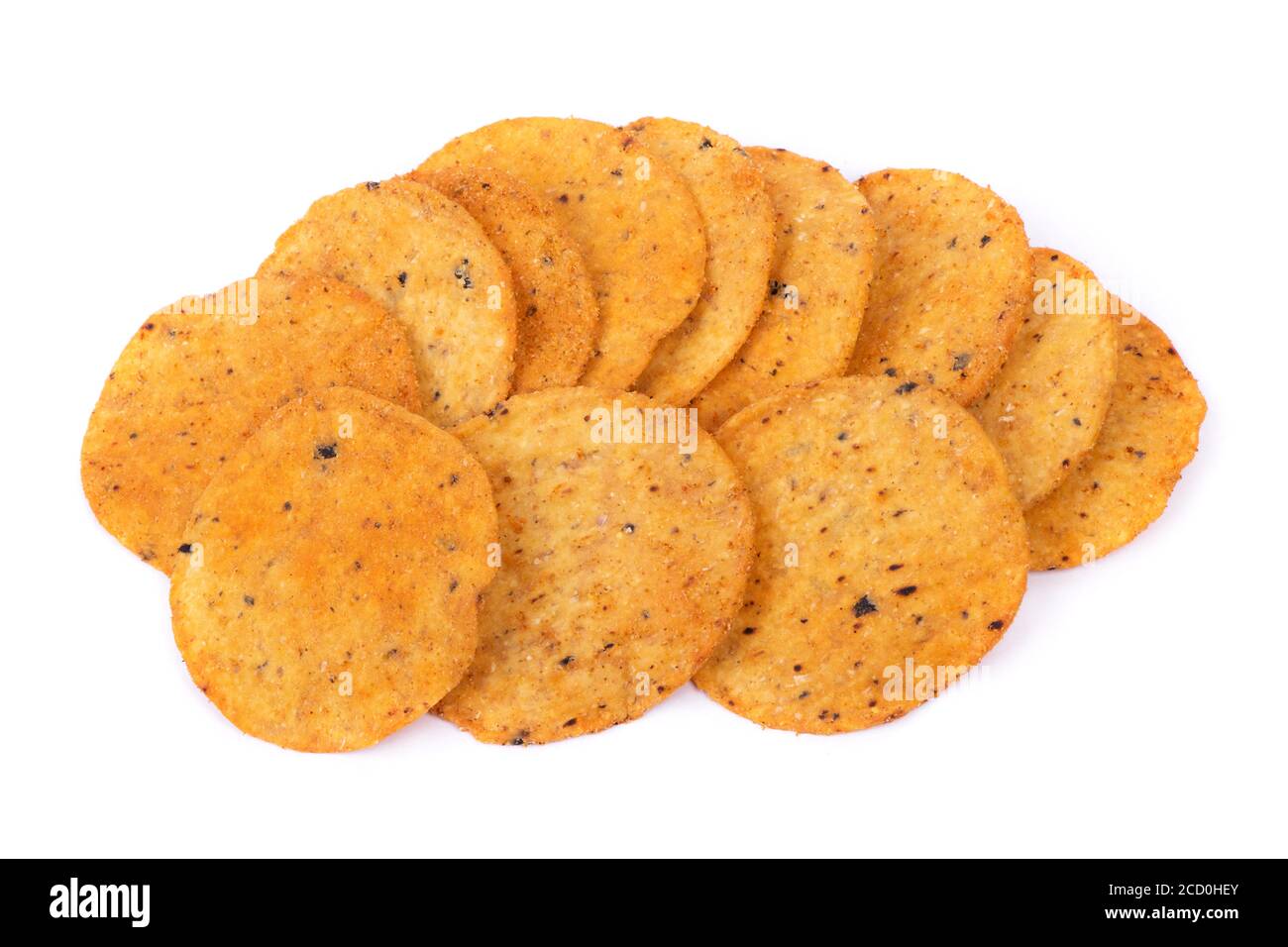 Heap of round nachos isolated on white background Stock Photo - Alamy