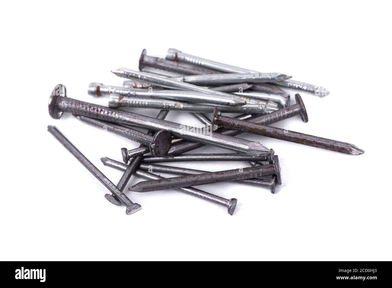 Group of small nails isolated on white background Stock Photo - Alamy