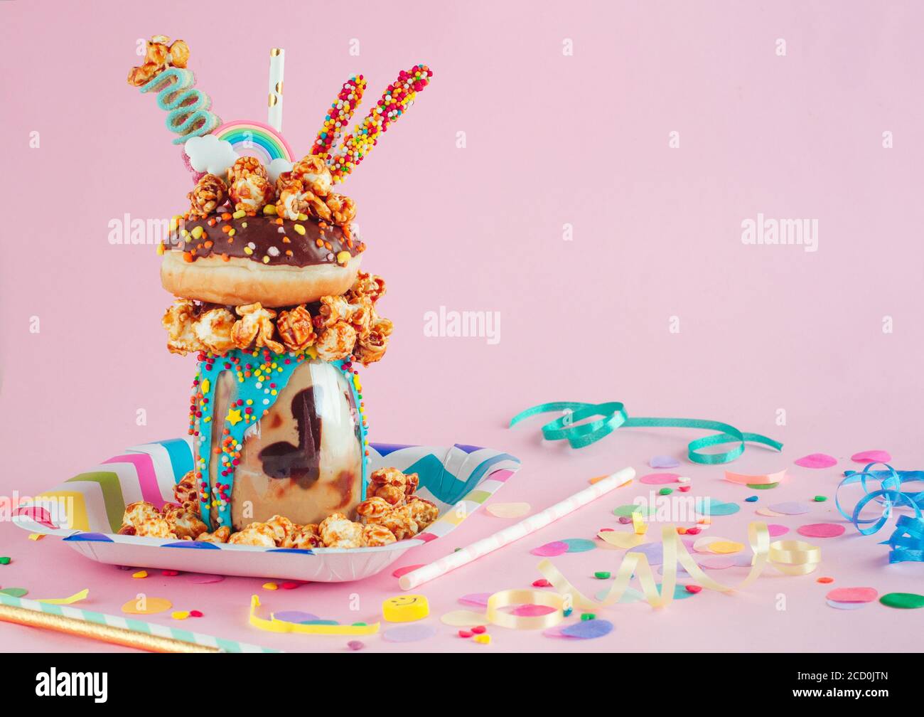 Kids party concept: Chocolate freak shake topping with donut and ...