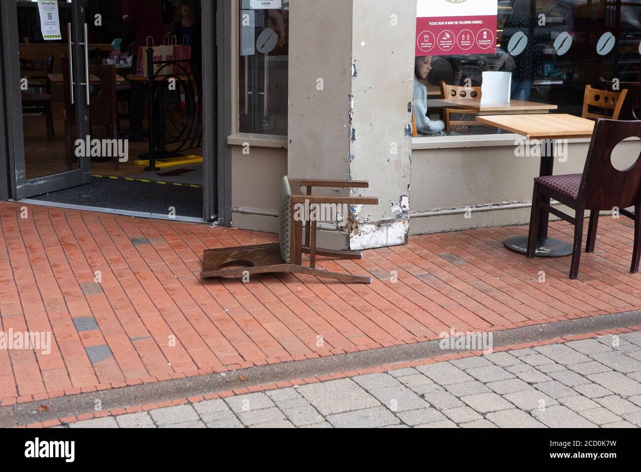 Blown over chair hi-res stock photography and images - Alamy