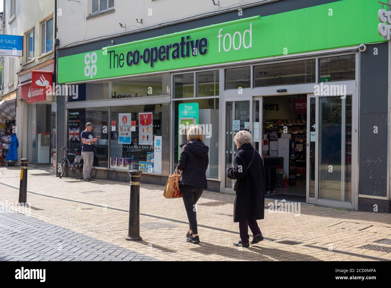 Co-Op shop front with people, Brixham, Devon, UK Stock Photo - Alamy