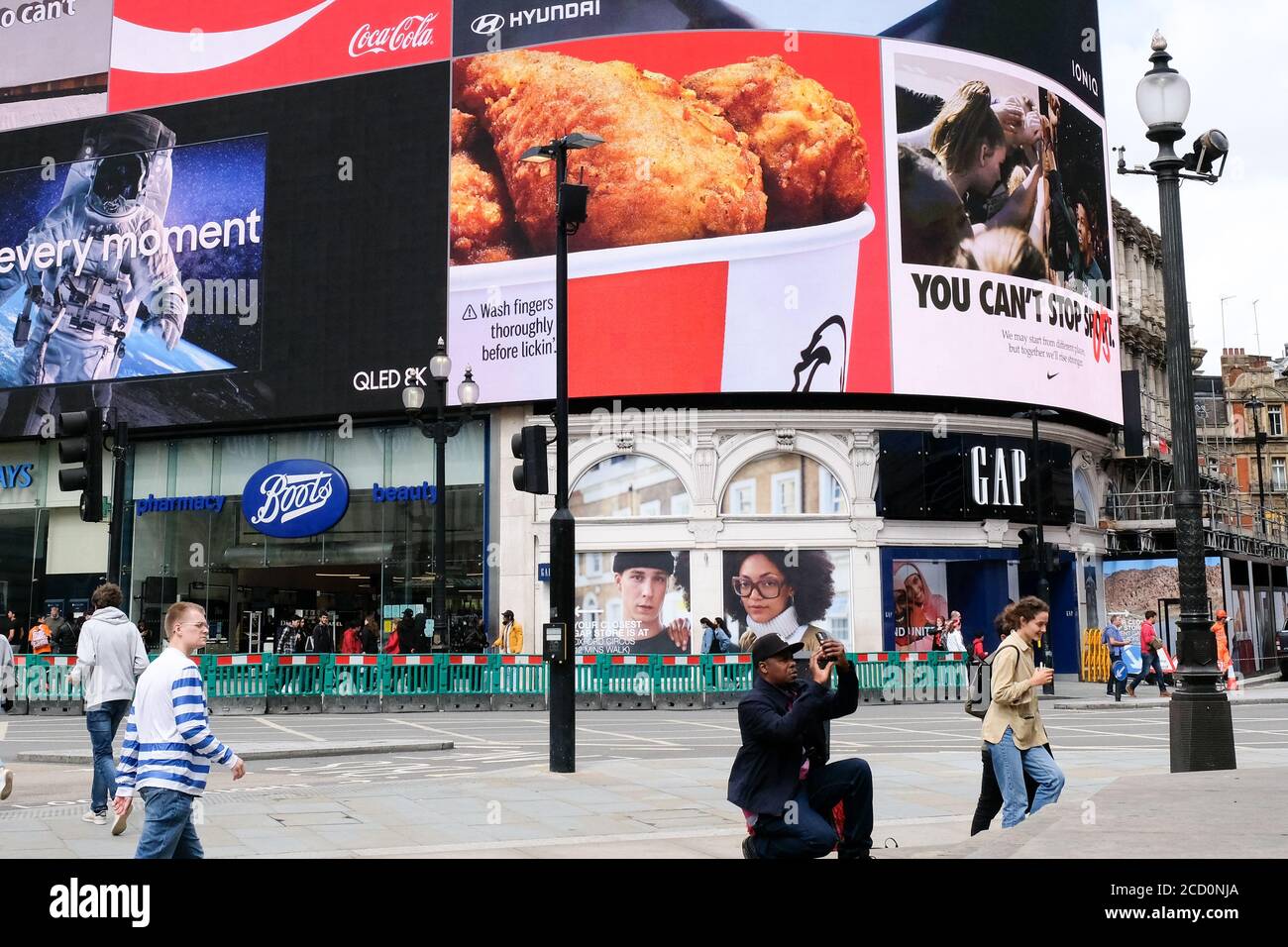 Piccadilly Circus, London, UK. 25th August 2020. KFC is dropping its ...