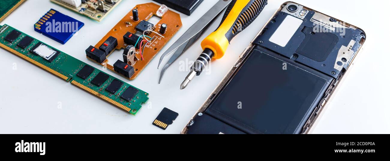 Close-up photos of mobile phones in a repair atelier Stock Photo - Alamy