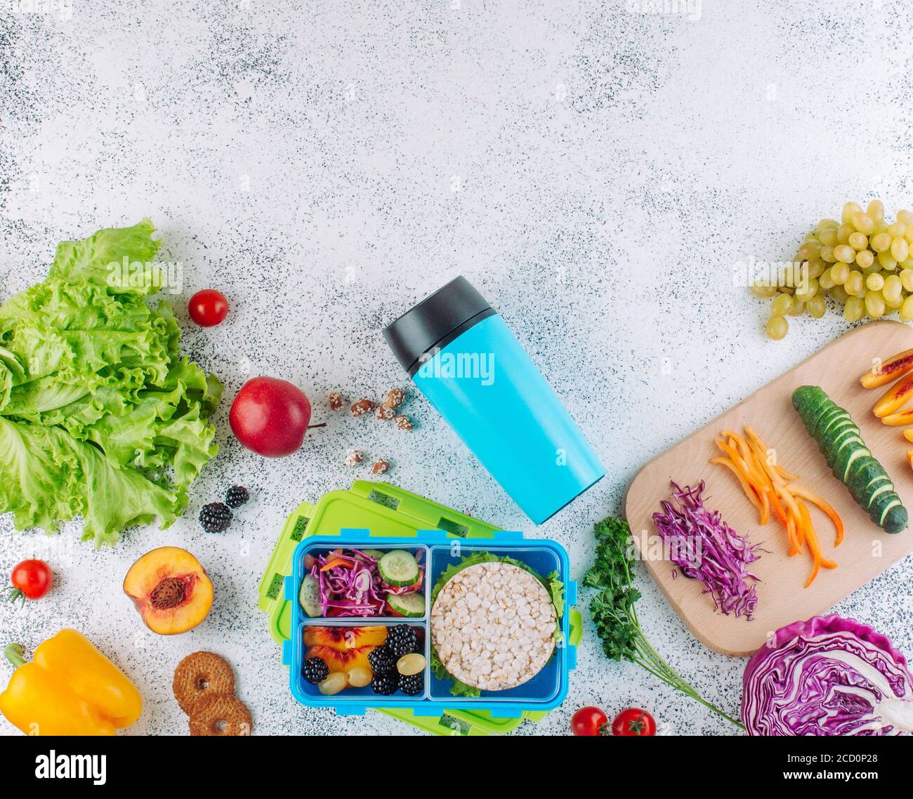 Healthy food concept. Open lunch box with sandwich, crispbreads, fruits ...