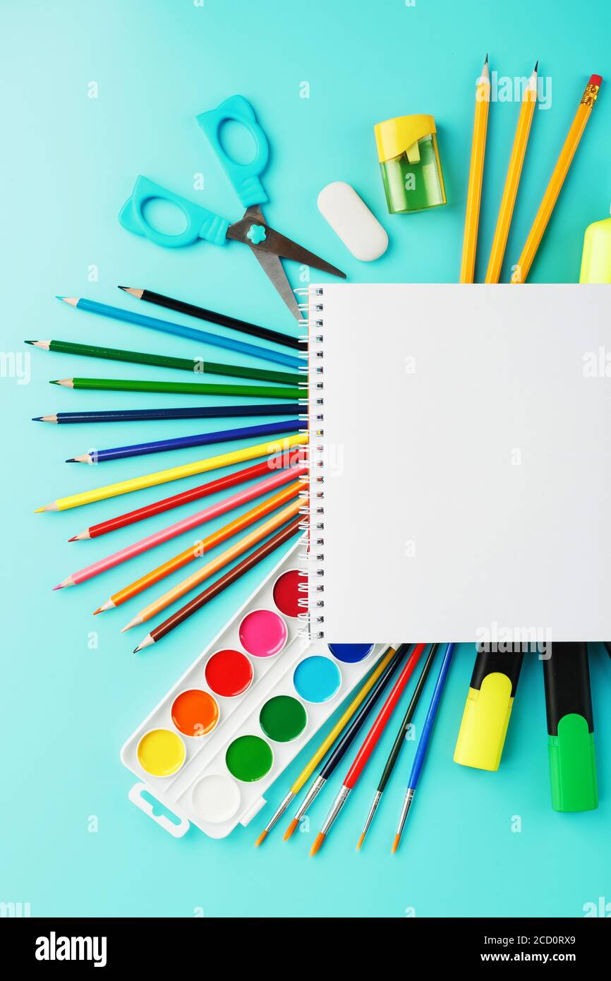 An album for creative development at school, with stationery on a ...