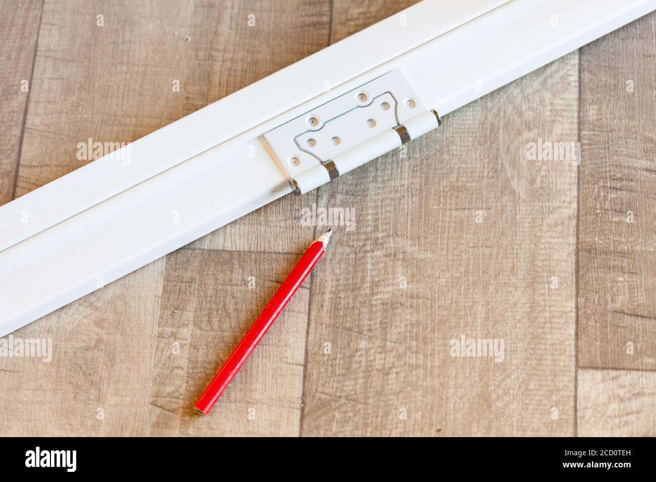 Door or window frame, hinge and pencil on a floor Stock Photo - Alamy