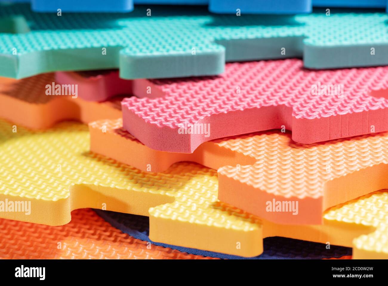 Macro photo of the details of a foam eva. Colored rubber mat puzzle for ...