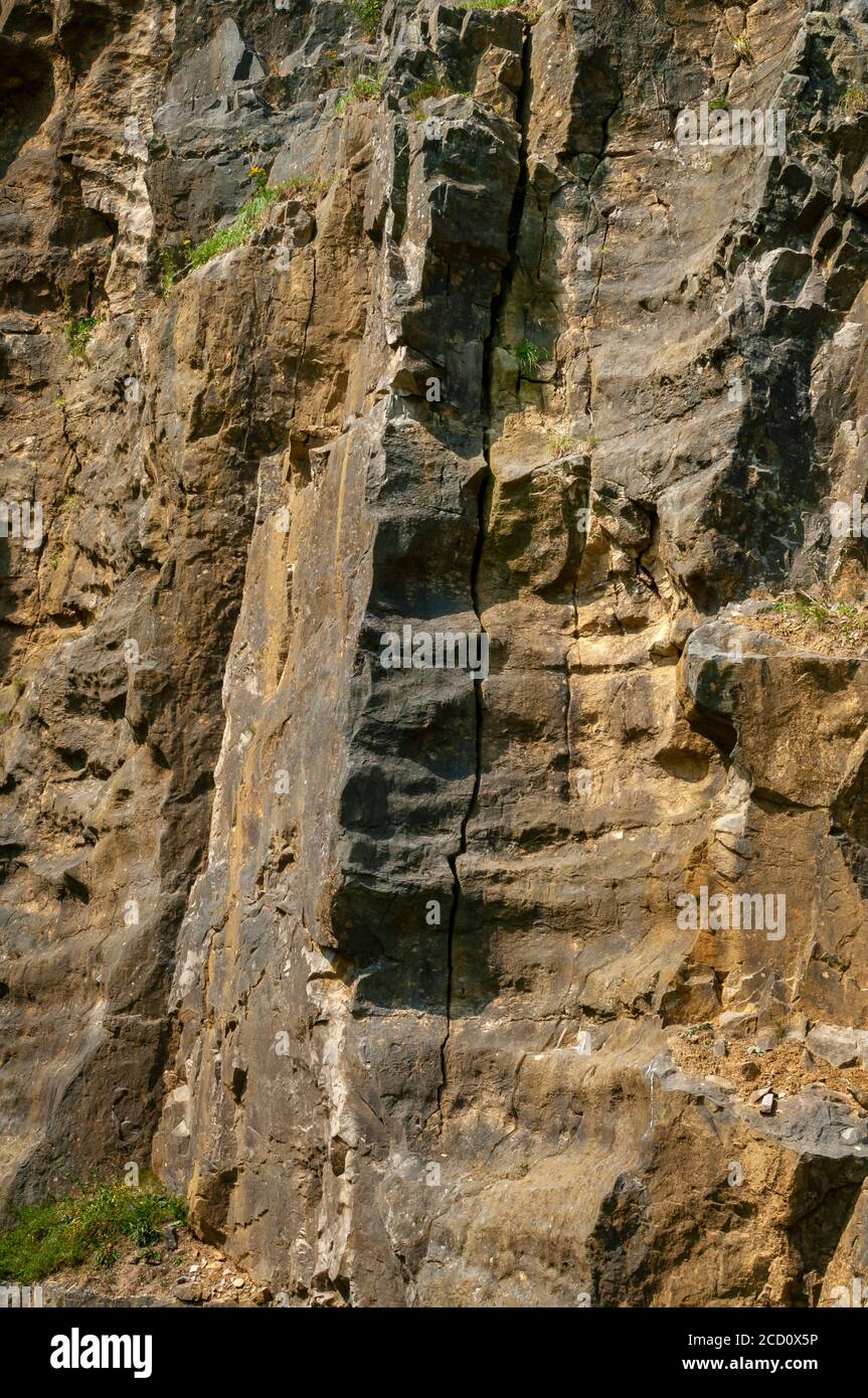 Natural cave system truncated by quarrying at the Dirtlow Pit, Dirtlow ...