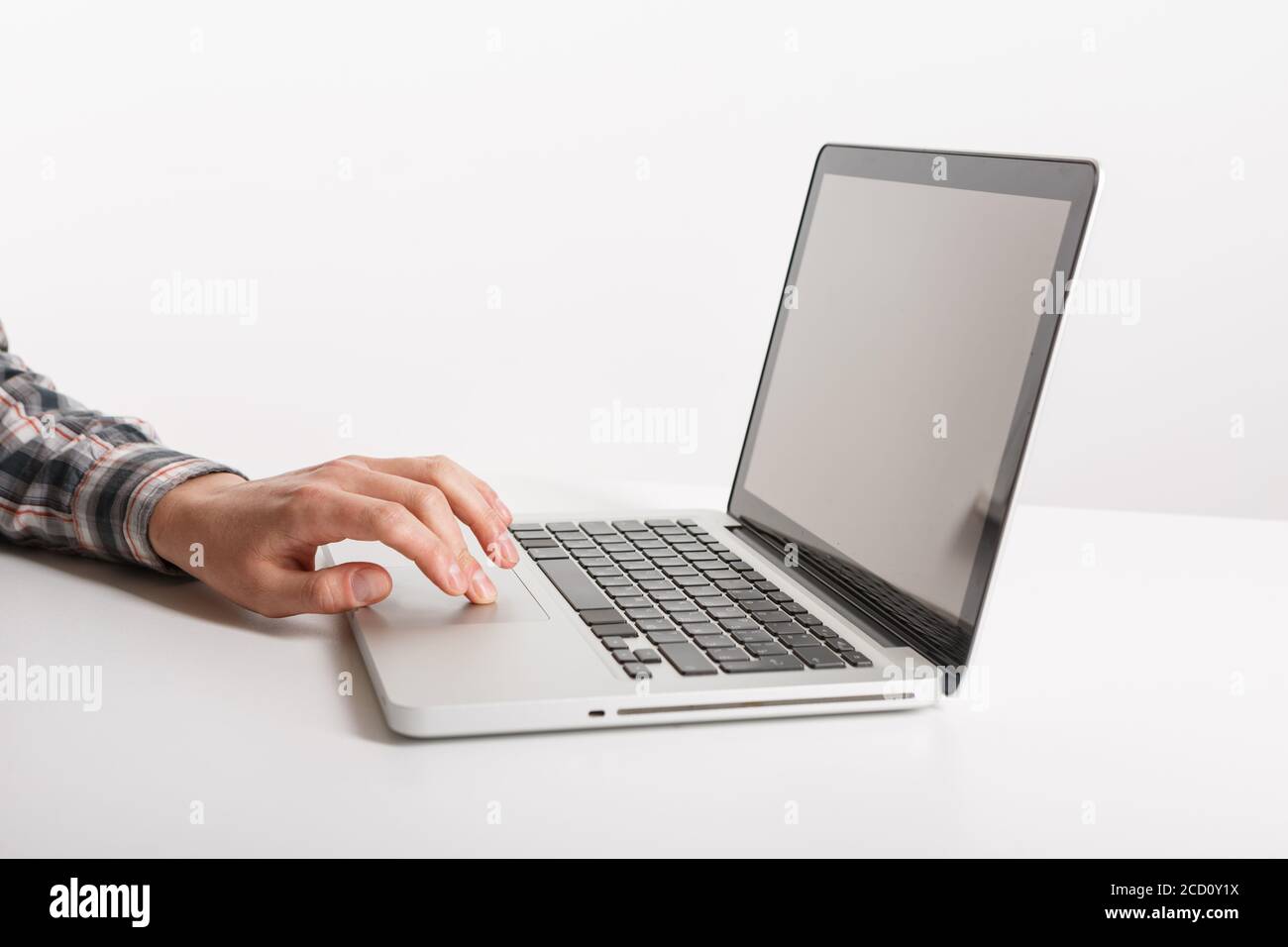 Laptop with man hand isolated on white background Stock Photo - Alamy