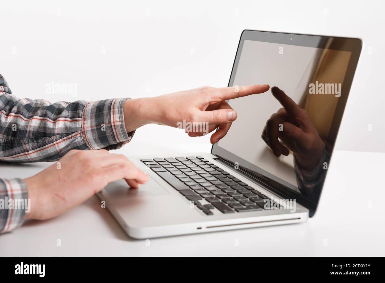 Laptop with man hand isolated on white background Stock Photo - Alamy