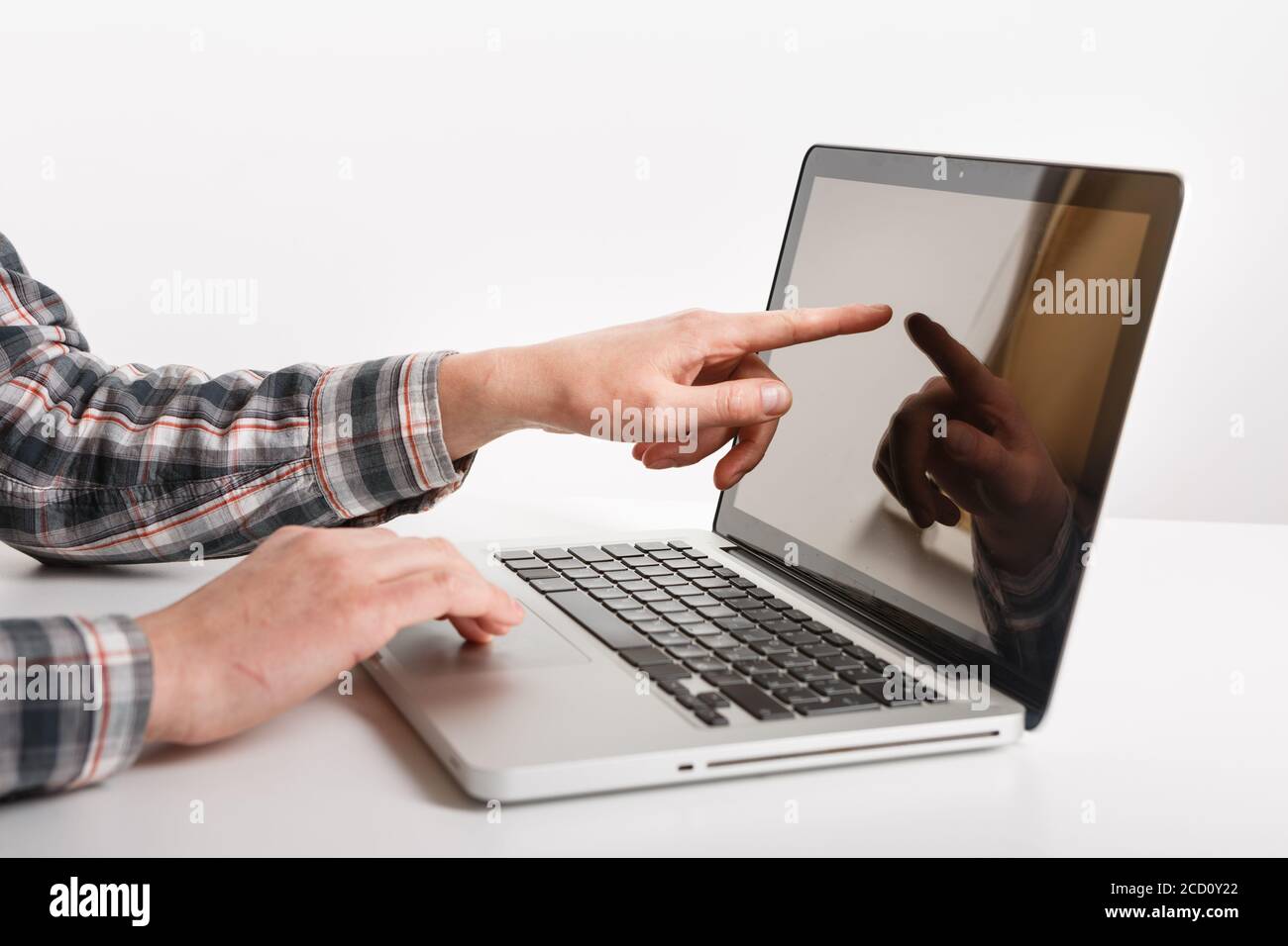 Laptop with man hand isolated on white background Stock Photo - Alamy