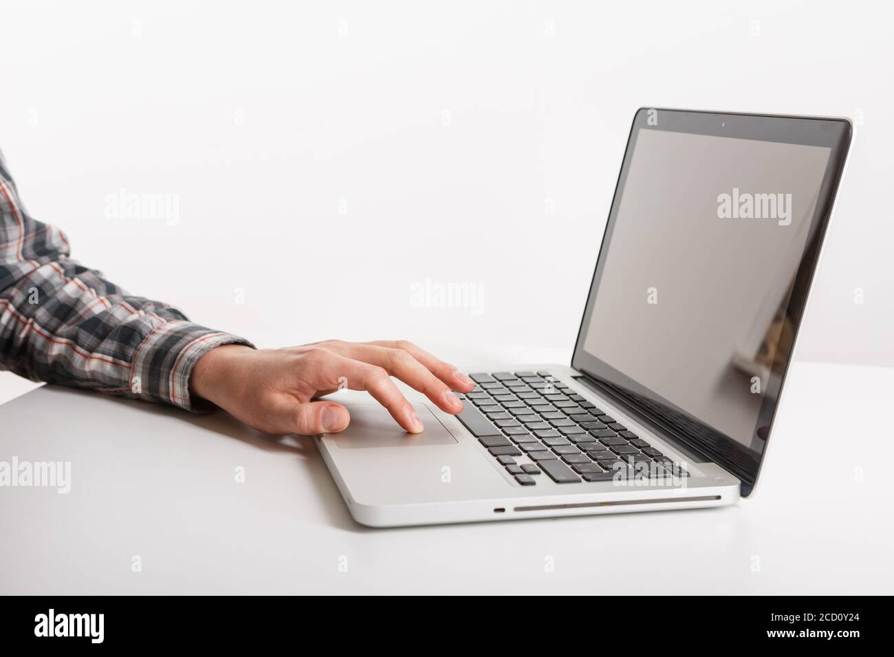 Laptop with man hand isolated on white background Stock Photo - Alamy