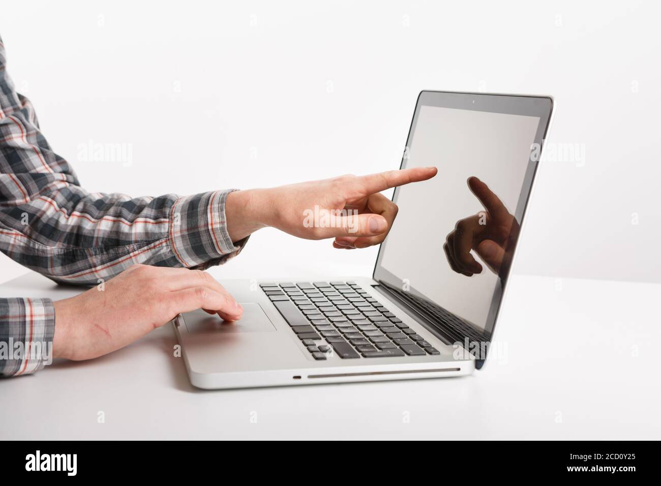 Laptop with man hand isolated on white background Stock Photo - Alamy