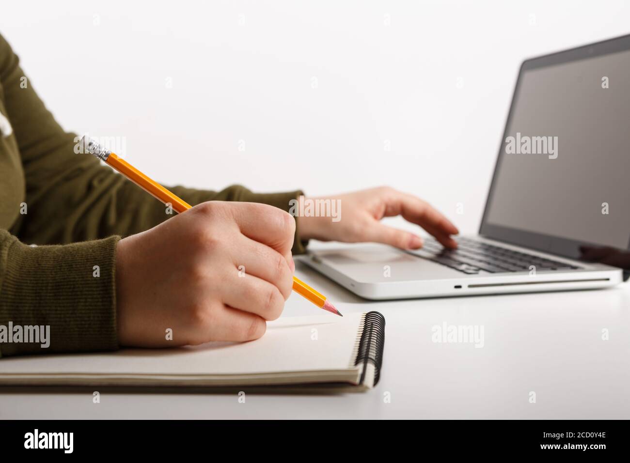 Laptop with woman hand isolated on white background Stock Photo - Alamy