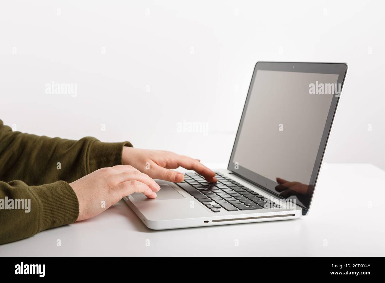 Laptop with woman hand isolated on white background Stock Photo - Alamy