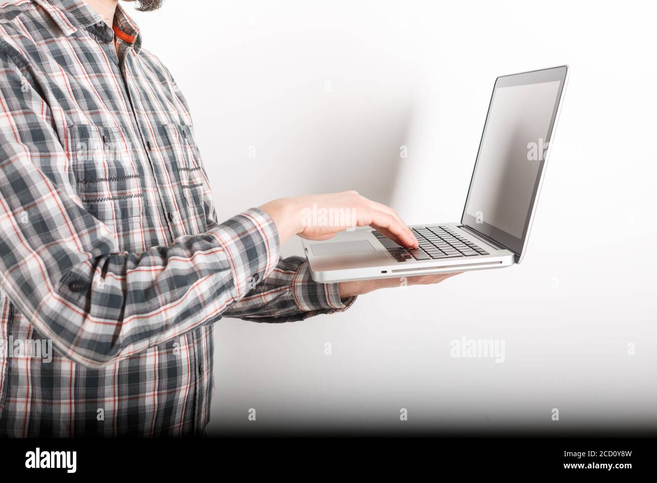 Laptop with man hand isolated on white background Stock Photo - Alamy