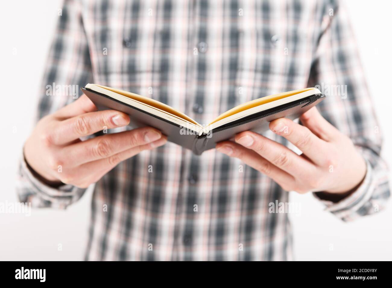 Hands Holding Up An Open Book To Face High Resolution Stock Photography ...