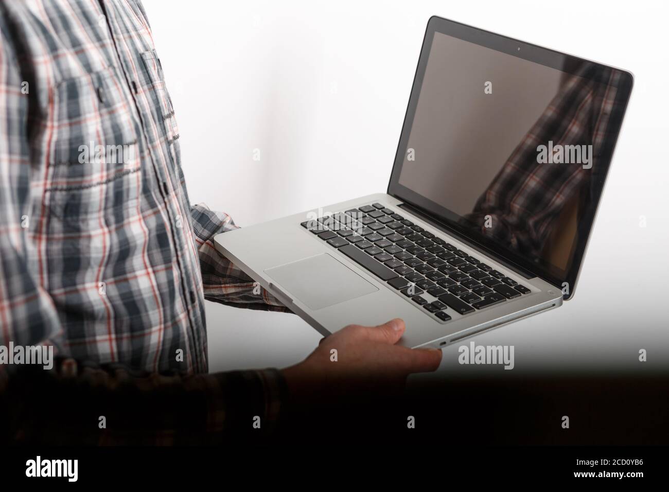 Laptop with man hand isolated on white background Stock Photo - Alamy