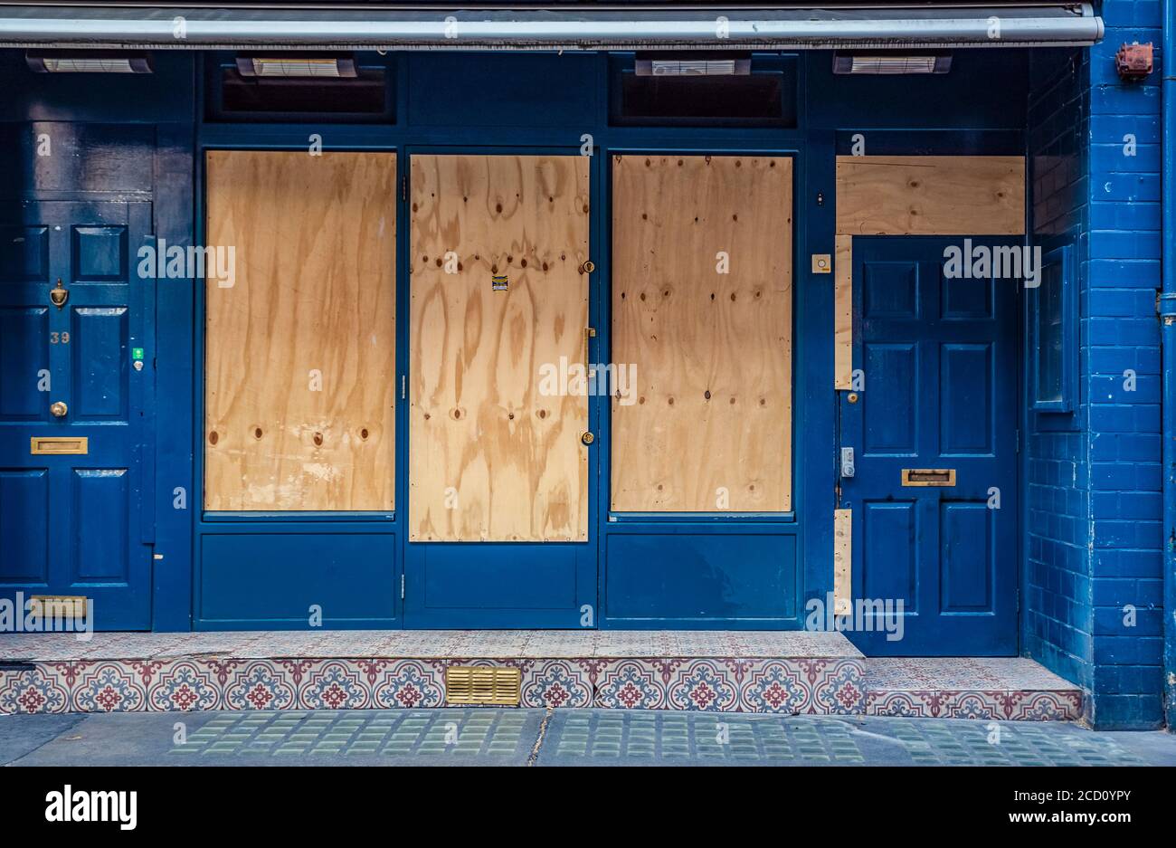 Windows boarded up on a building during national lockdown in London ...
