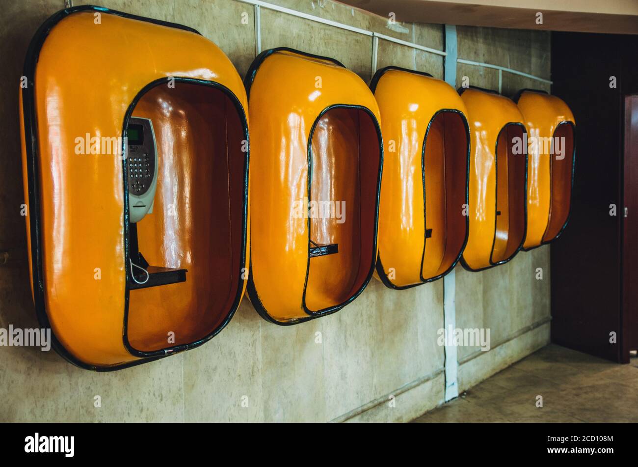 Retro vintage yellow and colorful phone booths Stock Photo - Alamy