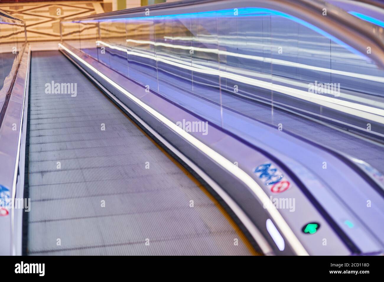 Moving walkway in shopping center. Horizontal slow-moving conveyor ...