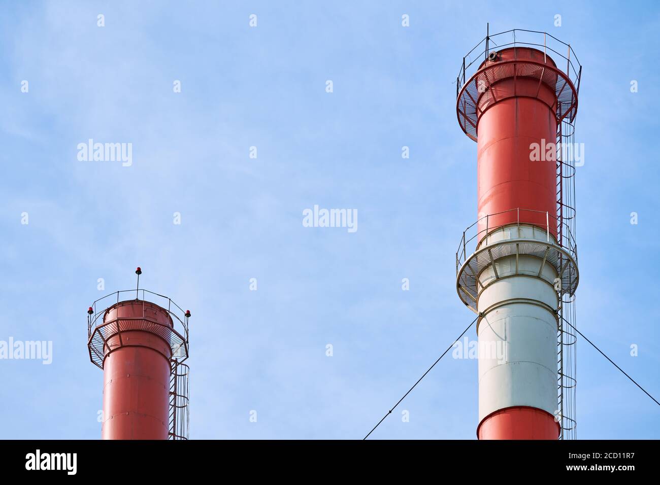 Factory chimney, copy space. Red and white. Industrial pipe without ...