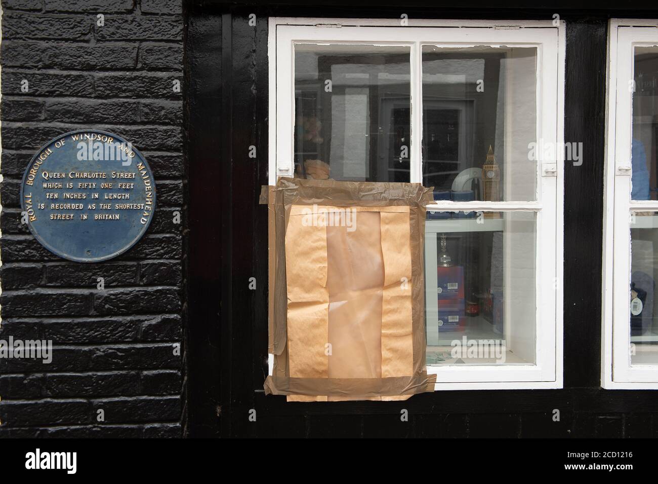 Windsor, Berkshire, UK. 25th August, 2020. A tourist shop window is ...