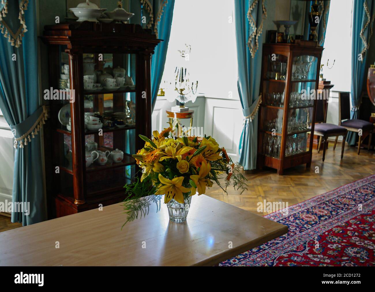 Yellow flower arrangement on the table in a beautiful place, flowers ...