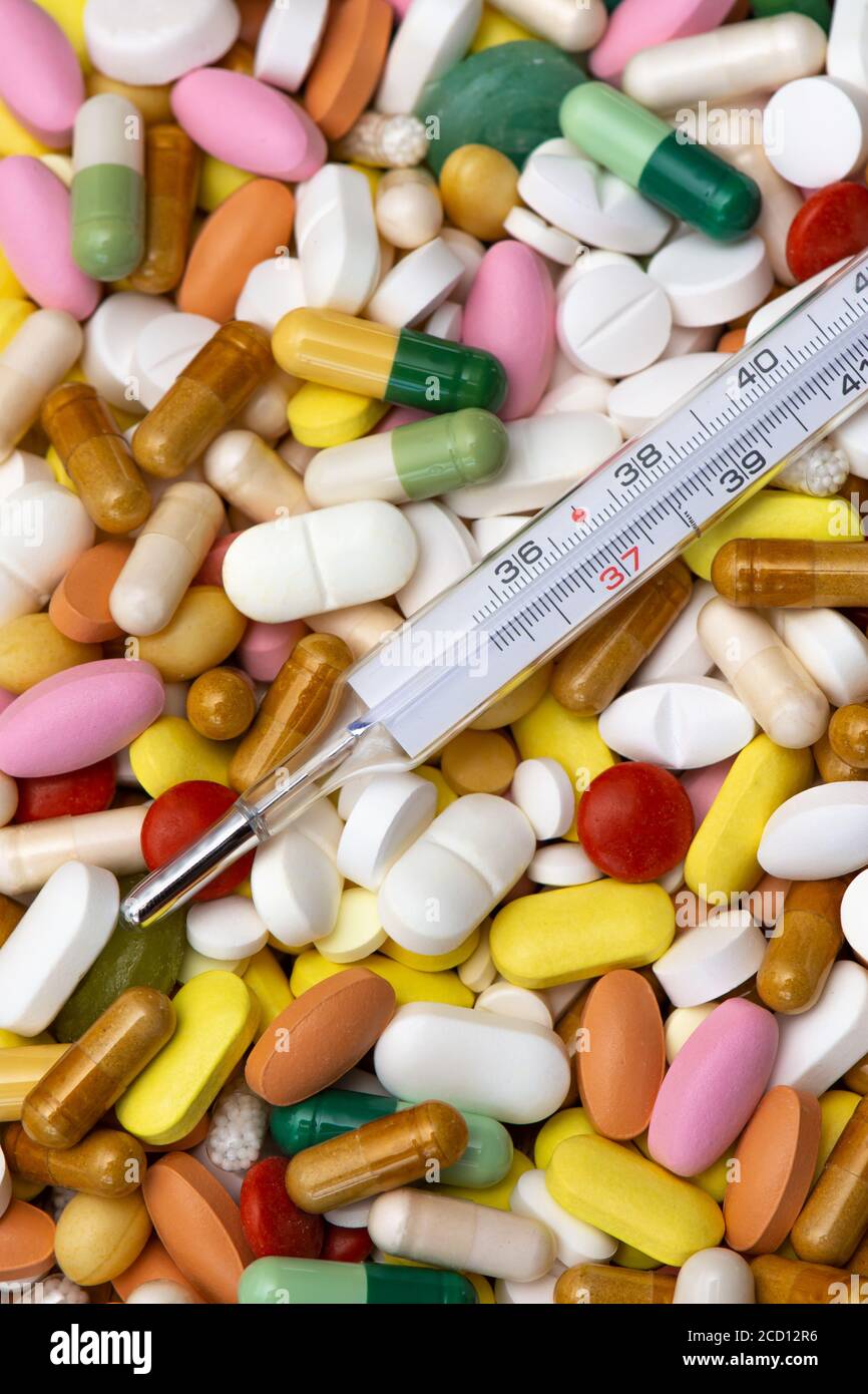 Thermometer indicating a normal temperature of 37 °C. Background of ...