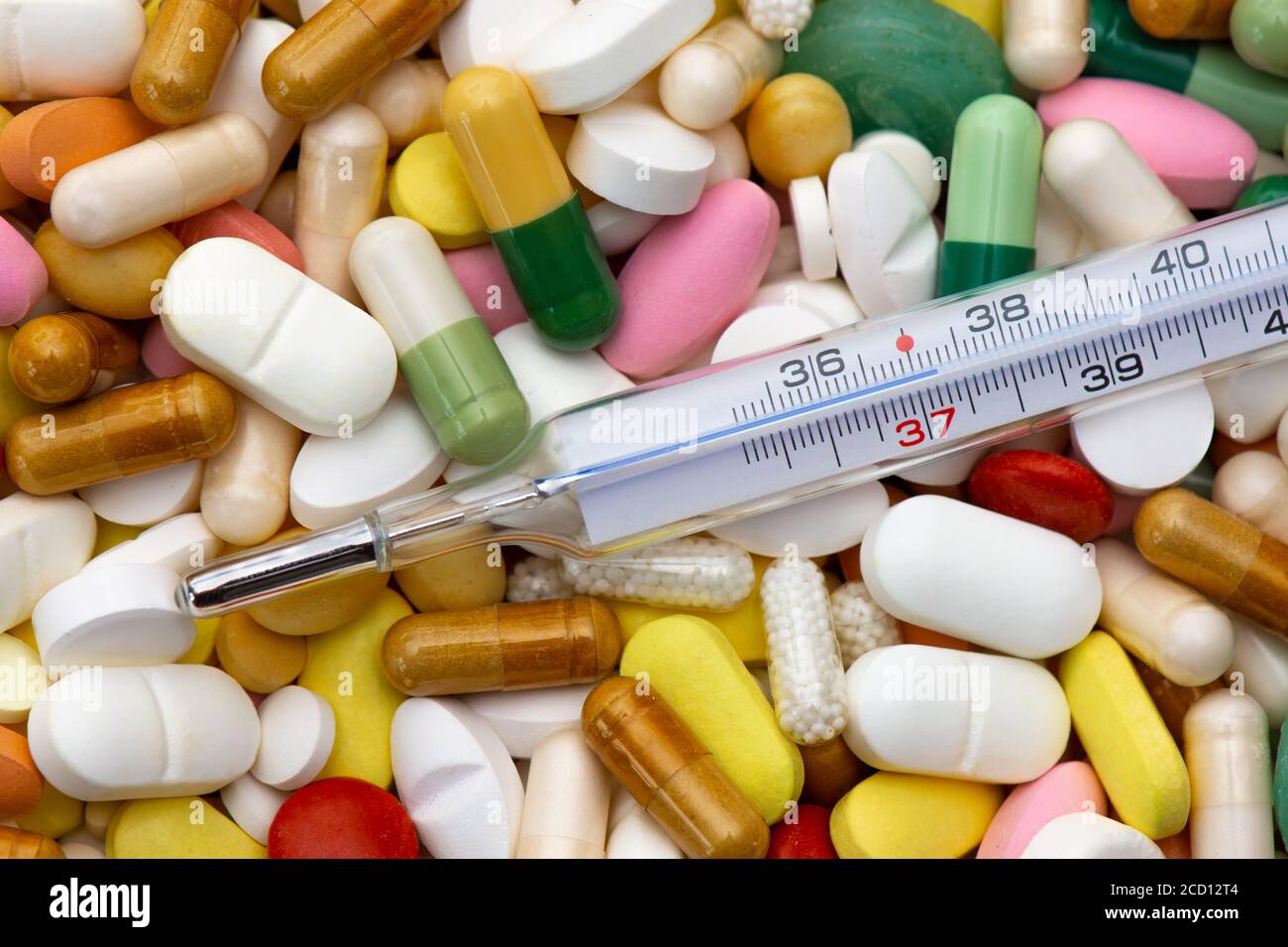 Thermometer indicating a normal temperature of 37 °C. Background of ...