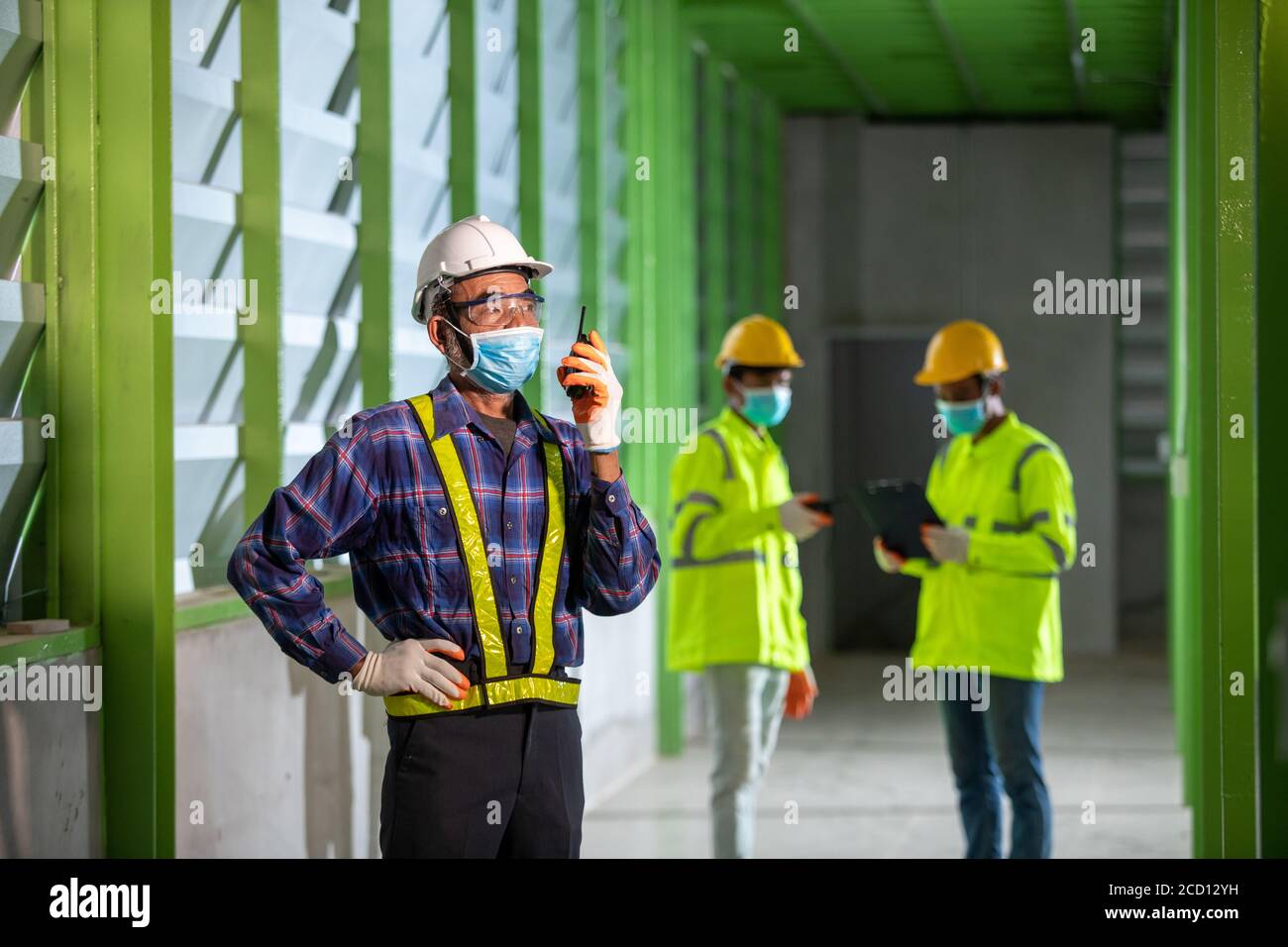 Asian worker under inspection and checking production process on ...