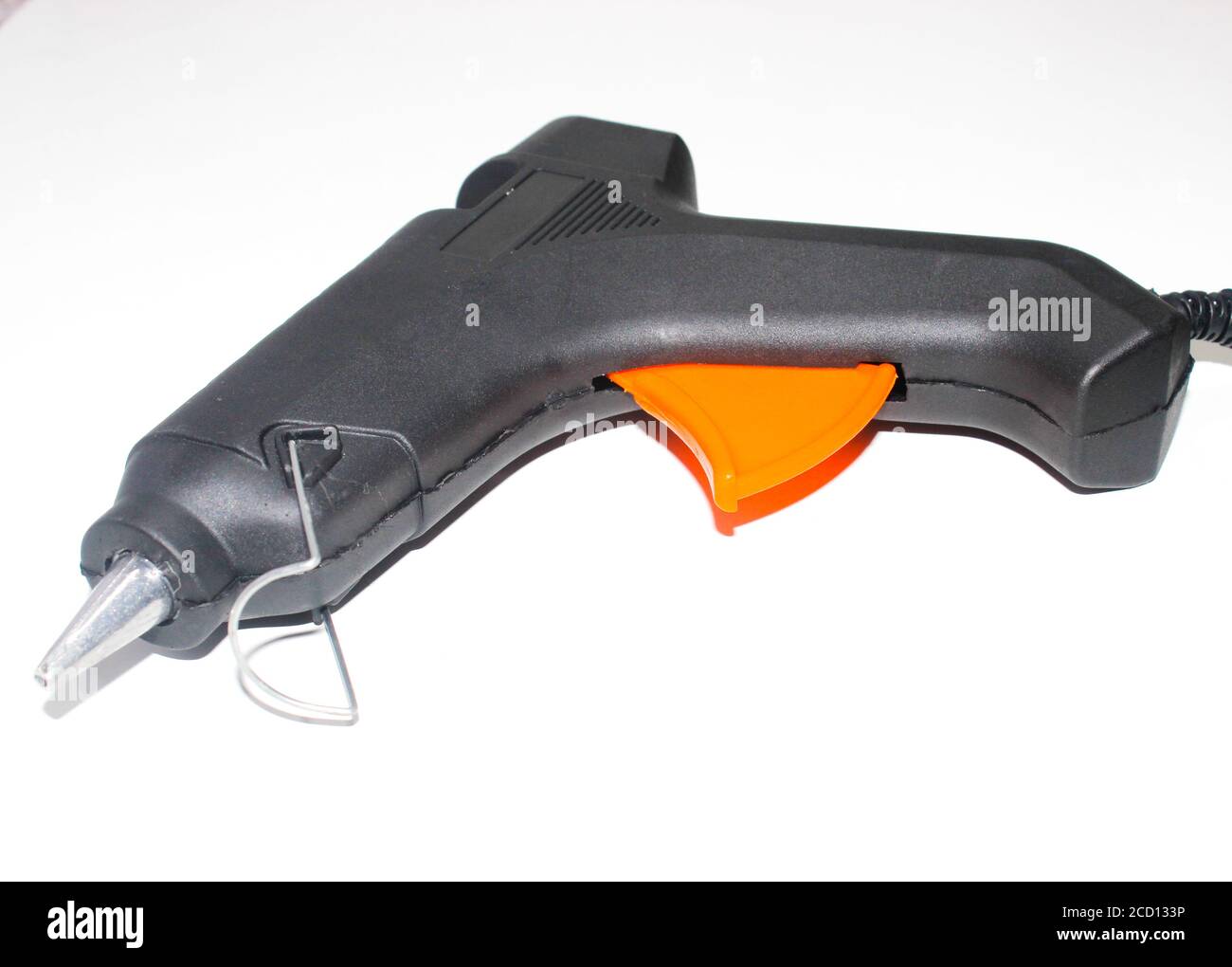 A picture of glue gun on white background Stock Photo - Alamy