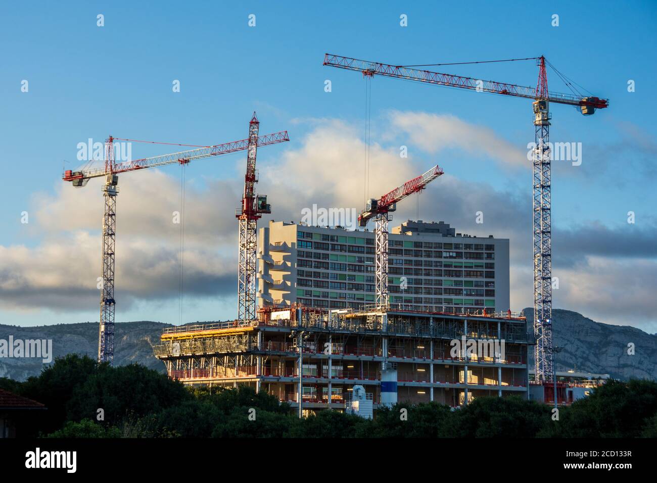 Construction site with four cranes Stock Photo - Alamy