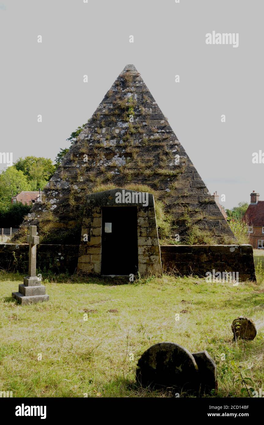 The 25 foot high Pyramid stands in the churchyard of Brightling Church ...
