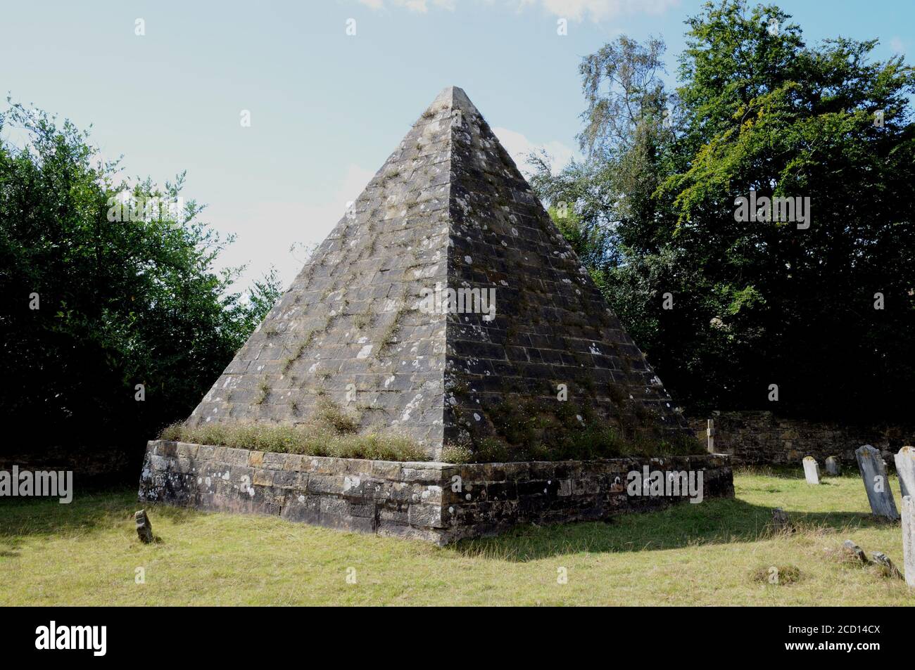 The 25 foot high Pyramid stands in the churchyard of Brightling Church ...