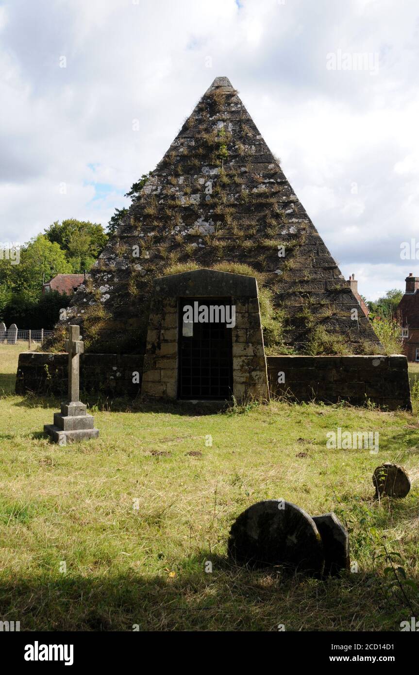The 25 foot high Pyramid stands in the churchyard of Brightling Church ...